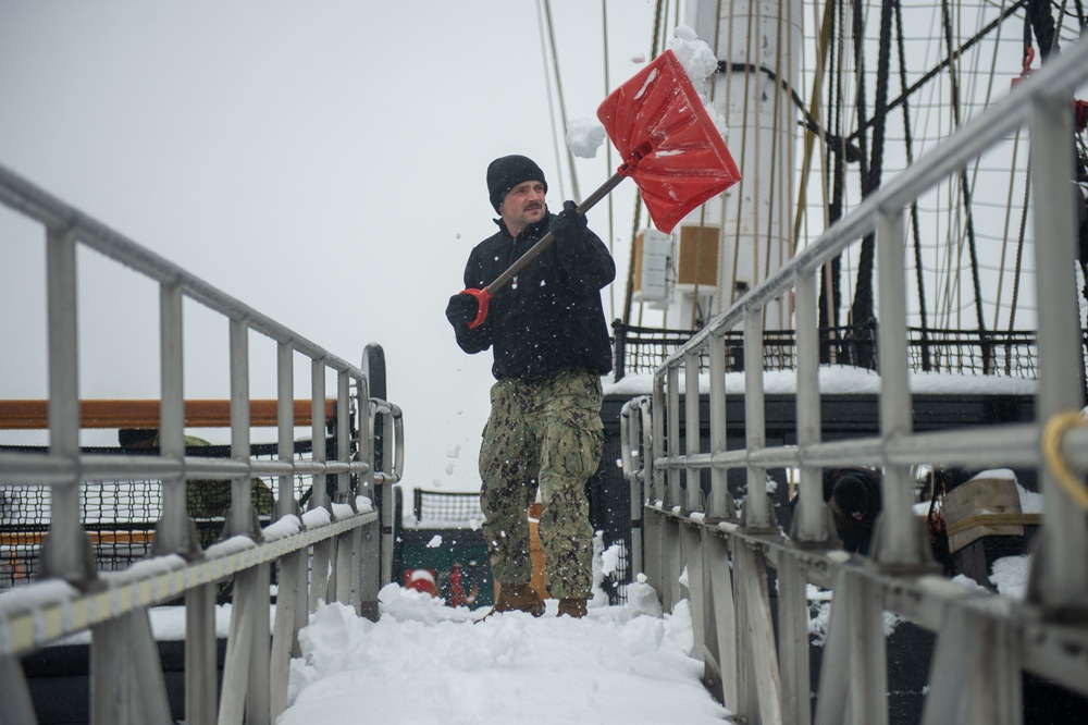 DVIDS - Images - USS Constitution Sailors shovel snow [Image 1 of 4]