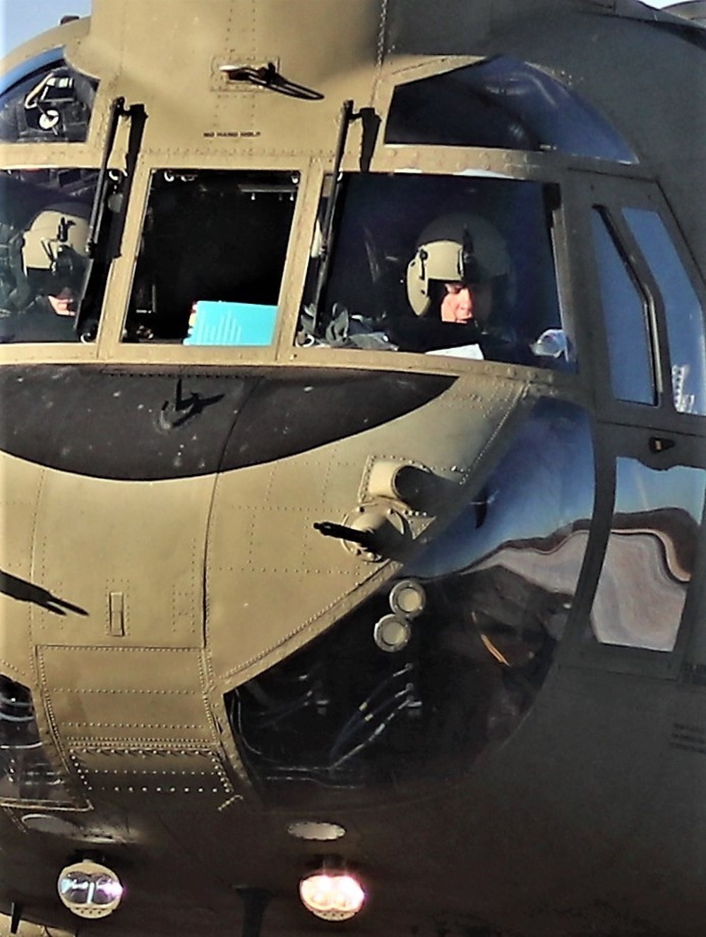 DVIDS - News - Photo Essay: Crew guides CH-47 Chinook for sling-load training support at Fort McCoy