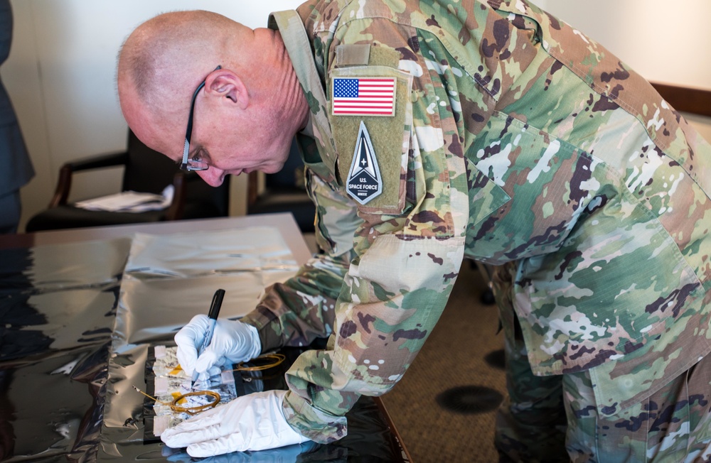 DVIDS - Images - Space Blanket signing ceremony [Image 3 of 9]