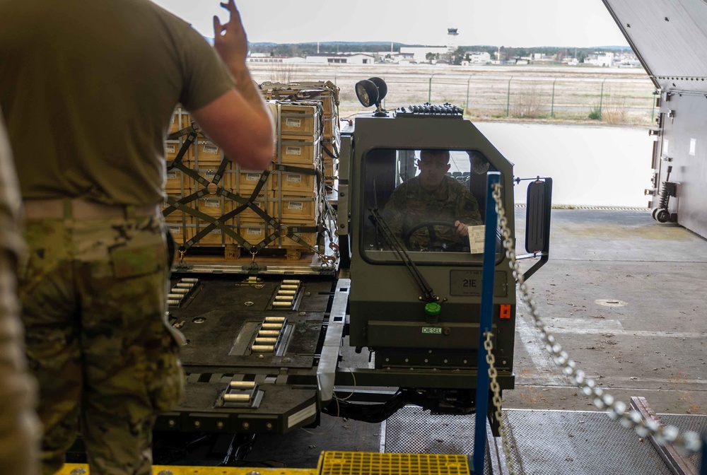 DVIDS - Images - 721st APS and 86th LRS Airmen load ammunition, cargo ...