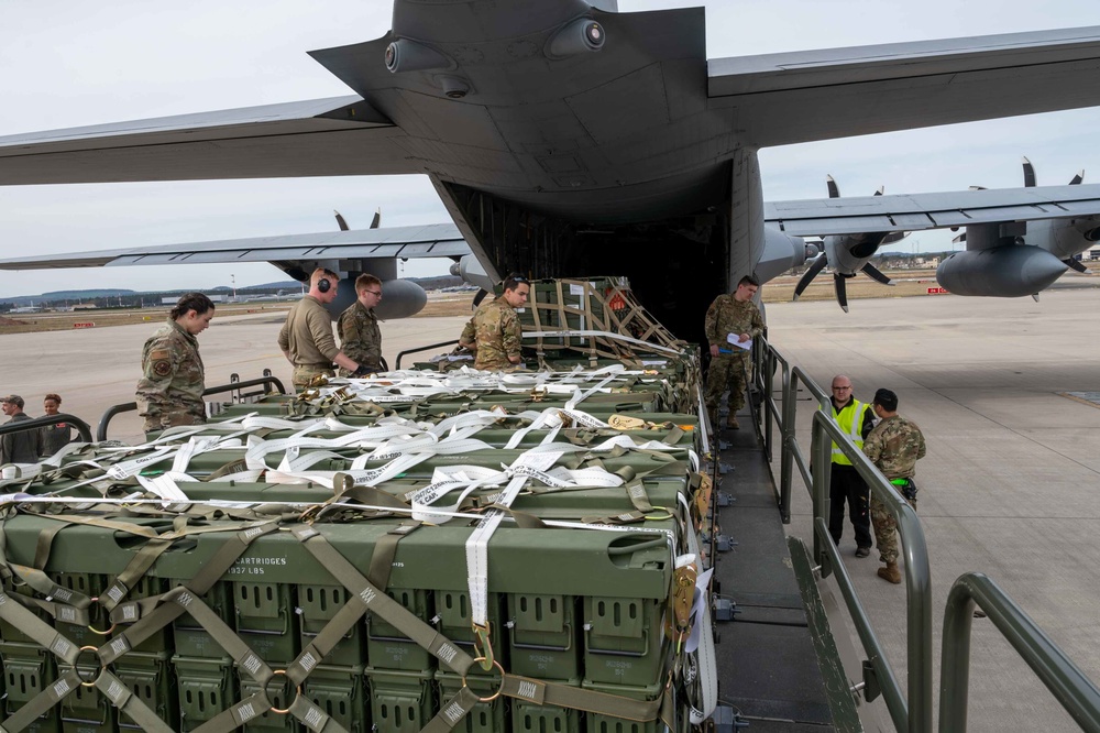 DVIDS - Images - 721st APS and 86th LRS Airmen load ammunition, cargo ...