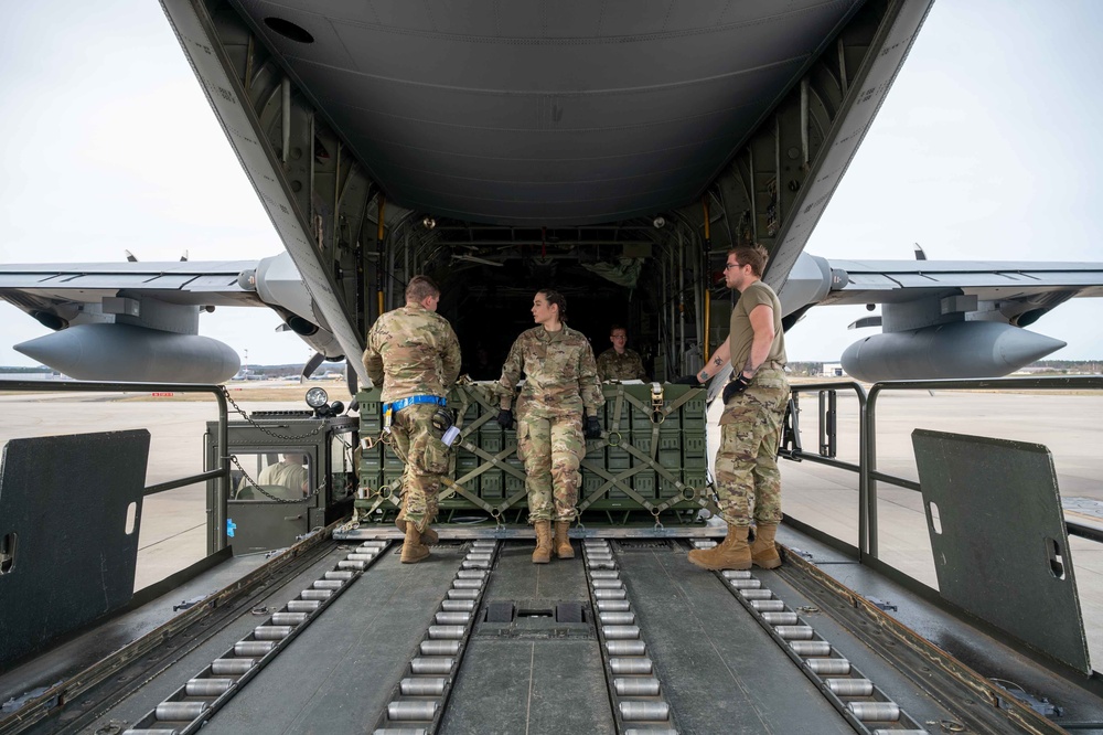 DVIDS - Images - 721st APS and 86th LRS Airmen load ammunition, cargo ...