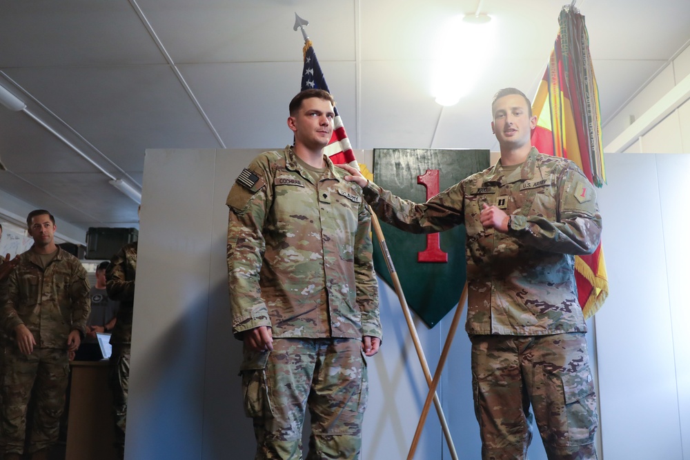 DVIDS - Images - HHB, 1st DIVARTY XO promotes, re-enlists Soldier ...