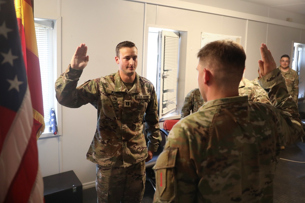 DVIDS - Images - HHB, 1st DIVARTY XO promotes, re-enlists Soldier ...