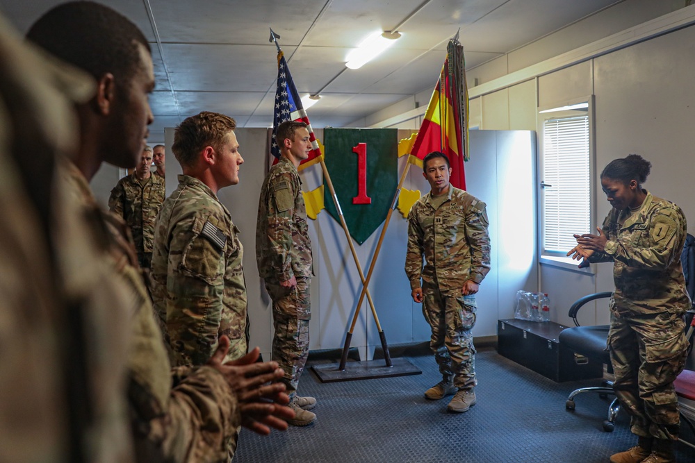 DVIDS - Images - HHB, 1st DIVARTY XO promotes, re-enlists Soldier ...
