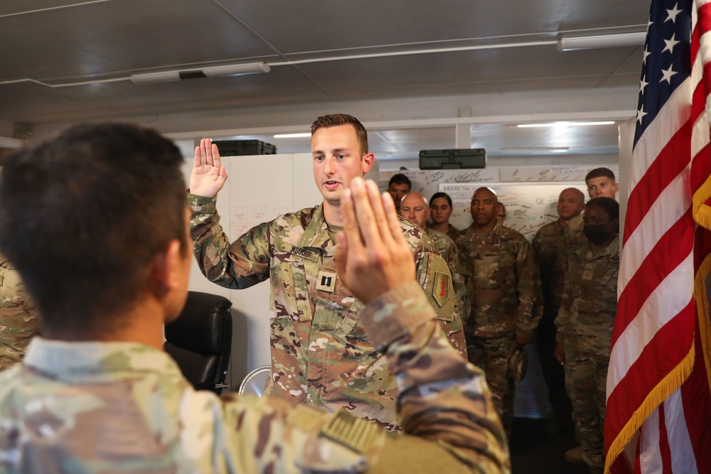 DVIDS - Images - HHB, 1st DIVARTY XO promotes, re-enlists Soldier ...