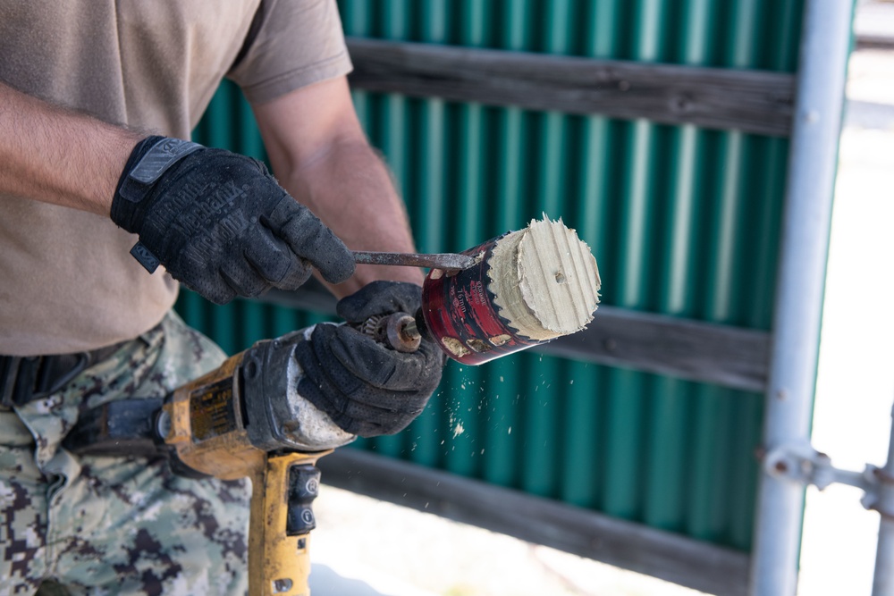 DVIDS - Images - NMCB-14 repairs a fuel dock at NASKW. [Image 10 of 17]