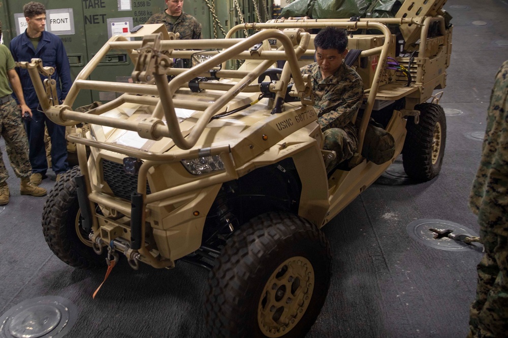 DVIDS - Images - Marines secure UTVs onboard Tripoli [Image 5 of 6]