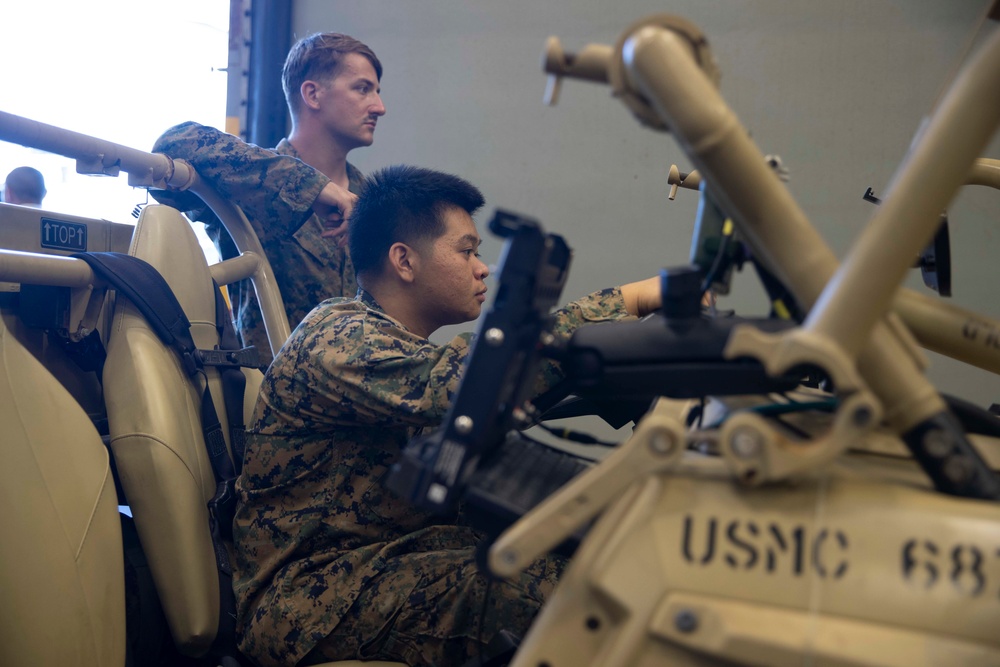 DVIDS - Images - Marines secure UTVs onboard Tripoli [Image 2 of 6]