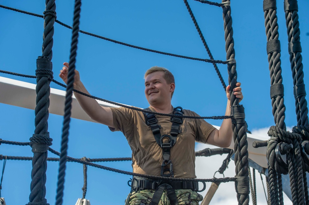 DVIDS - Images - Sailor climbs abord USS Constituiton [Image 1 of 5]