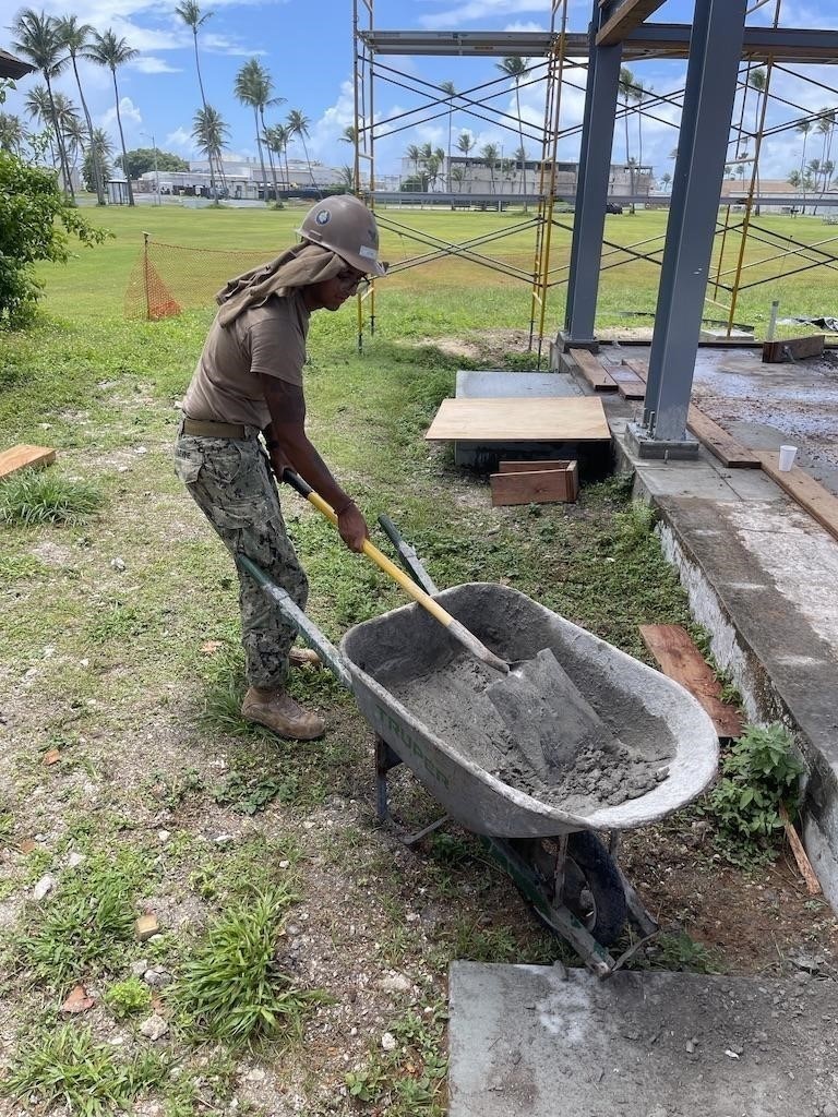 DVIDS - Images - Builder 3rd Class Darren Levine, mixes mortar for the ...