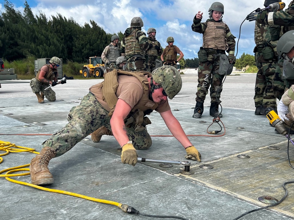 DVIDS - Images - NMCB 11 and 554th Red Horse Squadron repair airfields ...