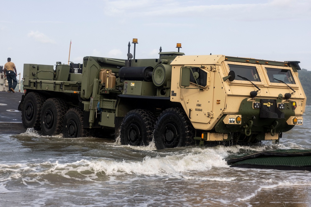 DVIDS - Images - Marines and Sailors offload equipment from INLS ...