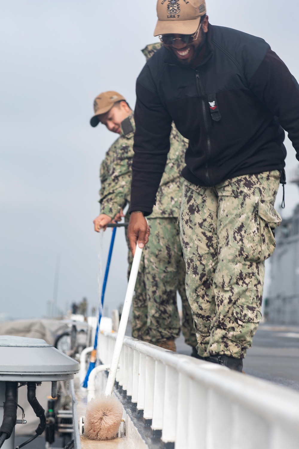 DVIDS - Images - Sailors clean the flight deck [Image 2 of 6]
