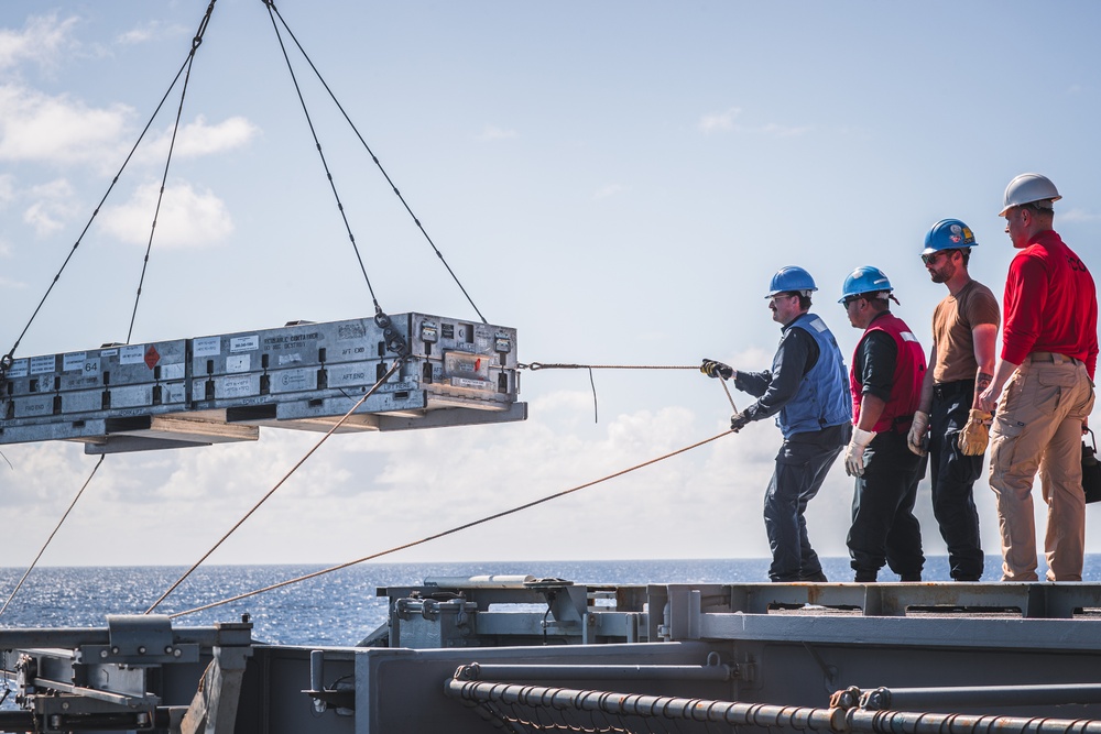 DVIDS - Images - George Washington onloads RAM missiles [Image 3 of 3]