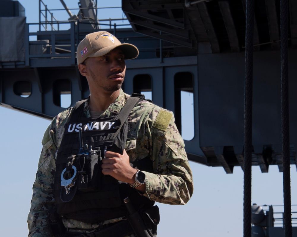 DVIDS - Images - a sailor stands guard aboard the USS Carl Vinson