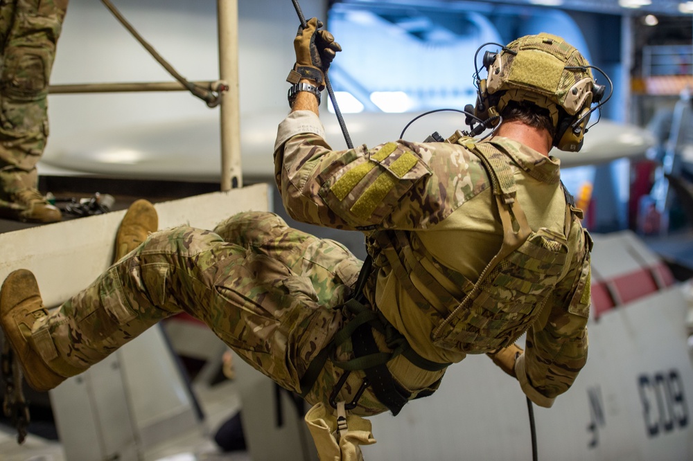 DVIDS - Images - Members of EODMU 5 Conduct Fast-Rope Exercise aboard ...
