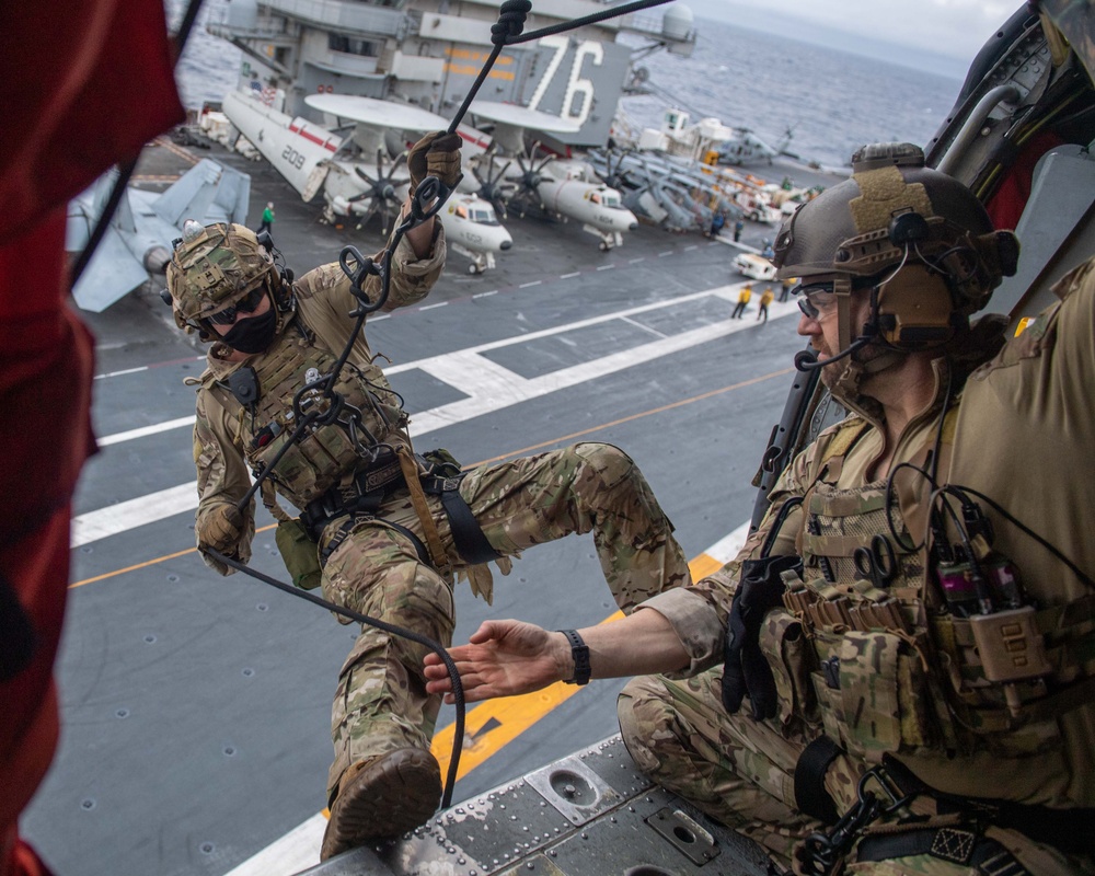 DVIDS - Images - Members of EODMU 5 conduct a hoisting and rappelling ...