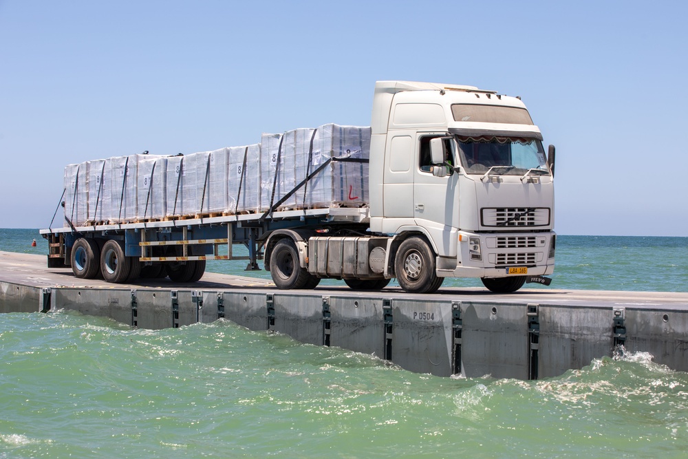 DVIDS - Images - Aid delivered across Trident Pier [Image 4 of 4]