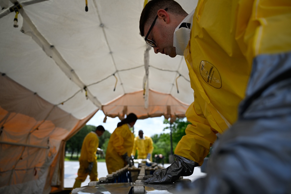 DVIDS - Images - Ensuring readiness: 316 MDG conducts decontamination ...