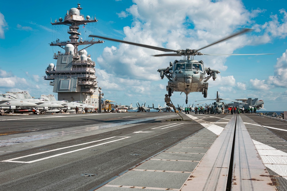 DVIDS - Images - EODMU 12 Fast Ropes onto Ford's Flightdeck [Image 2 of 9]