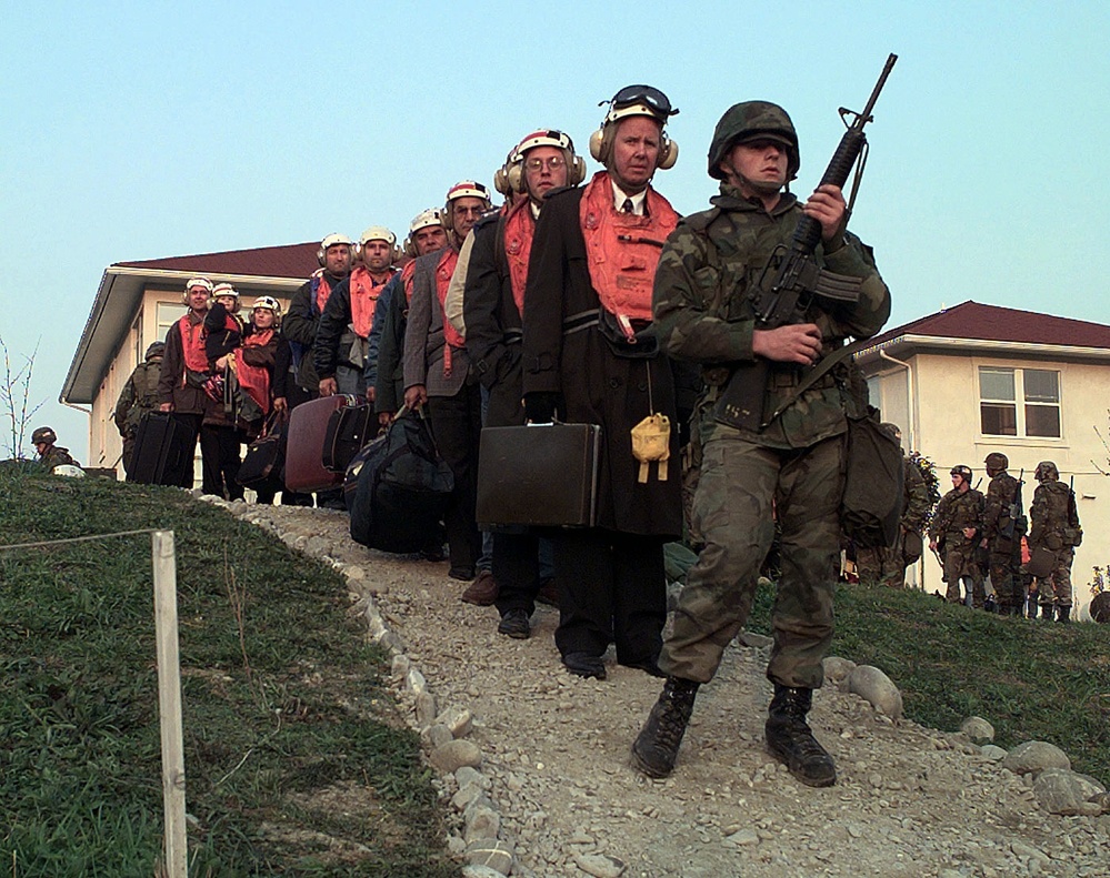 DVIDS - Images - American citizens walk through a heavily guarded ...
