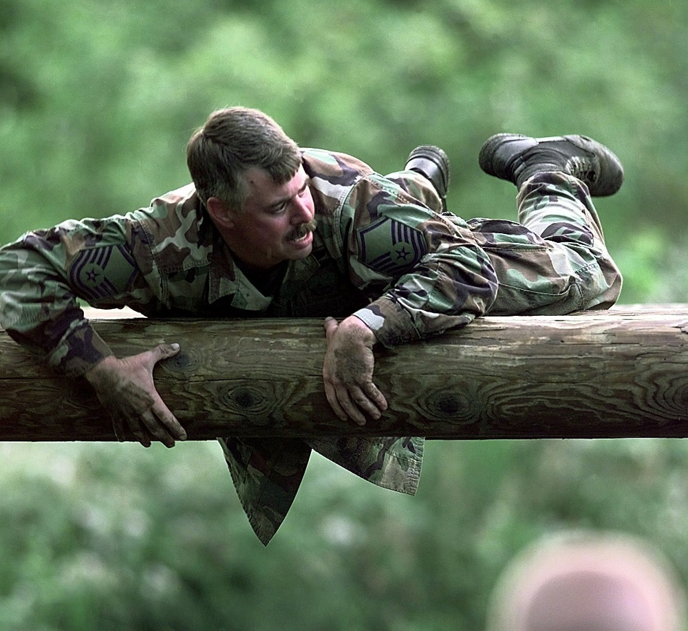 DVIDS - Images - Master Sgt. Roberts goes over an obstacle during the ...