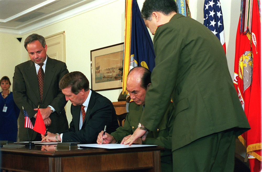 DVIDS - Images - Secretary Cohen and Gen. Zhang sign an agreement on ...
