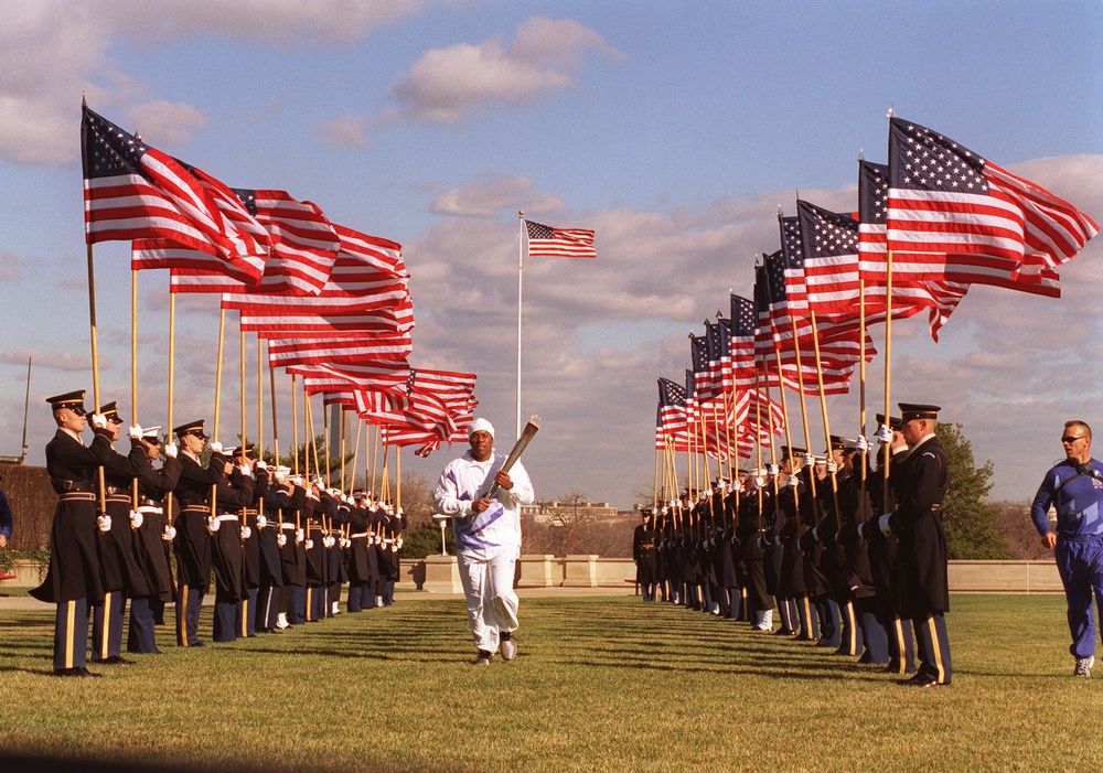 DVIDS - Images - Chief Petty Officer Bernard Brown carries the Olympic ...