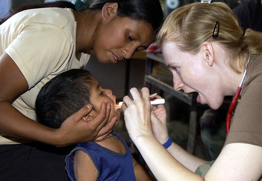 DVIDS - Images - Capt. Carrie Schmid examines the mouth of a Honduran ...