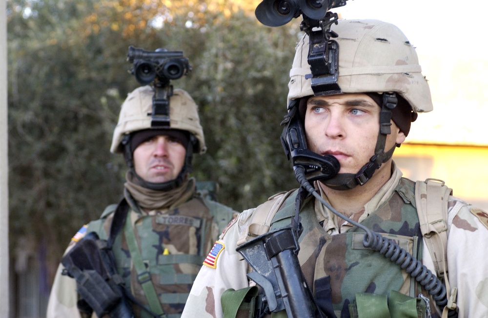DVIDS - Images - U.S. Army soldiers guard the courtyard of a house.