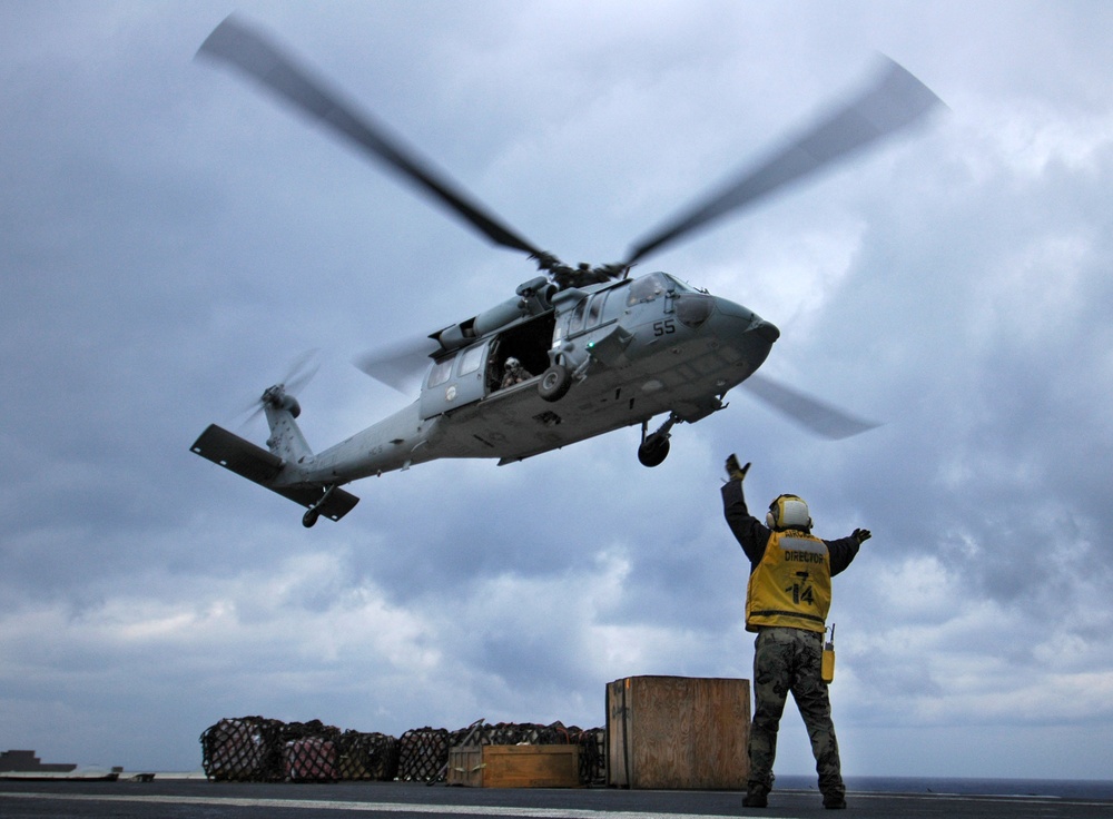 DVIDS - Images - Airman Matt Newell directs the pilot of MH-60S ...