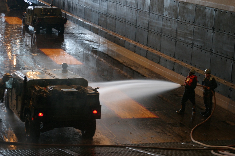 DVIDS - Images - Armored Humvees are washed down with fresh water.
