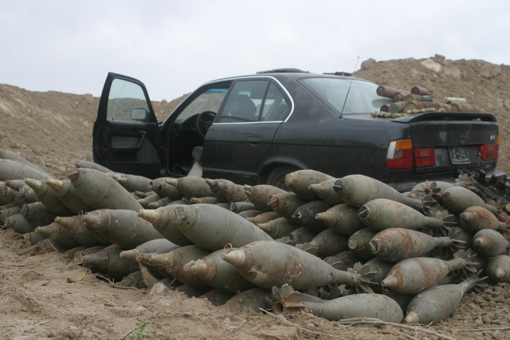 DVIDS - Images - U.S. Marines examine mortar rounds and a BMW ...