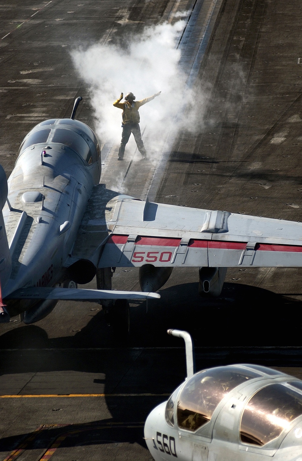 DVIDS - Images - A U.S. Navy aircraft handler directs an EA-6B Prowler ...