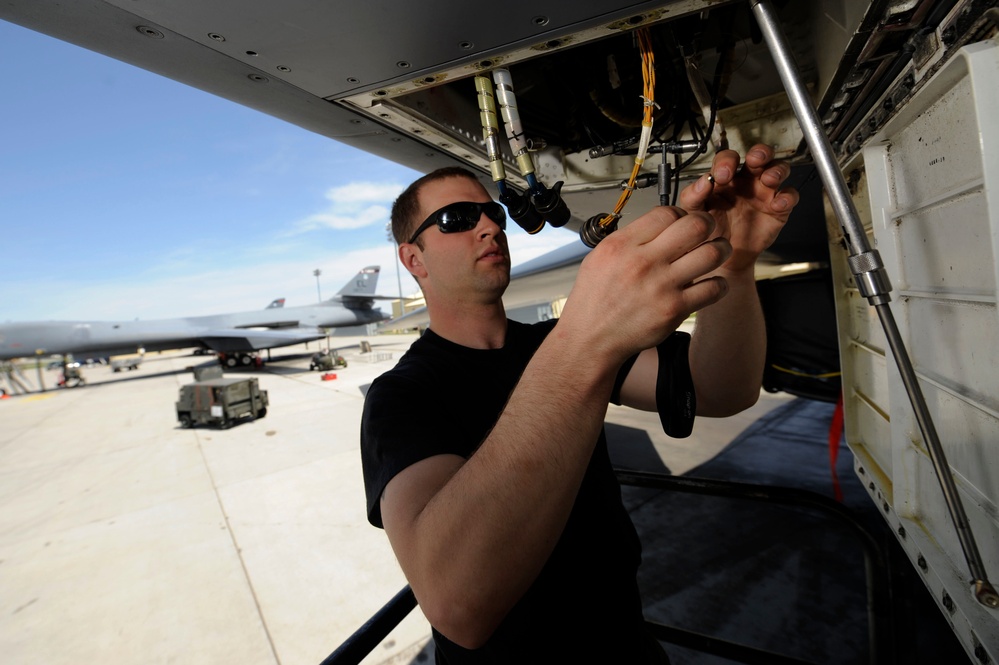 DVIDS - Images - Senior Airman Robert Austin replaces a transmitter for ...