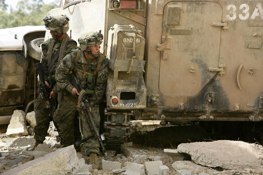 DVIDS - Images - U.S. Marines take cover behind a M113 medium ...