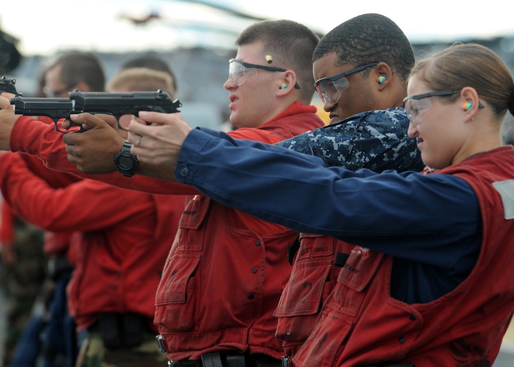 DVIDS - Images - U.S. Navy sailors fire 9 mm Beretta pistols during a ...