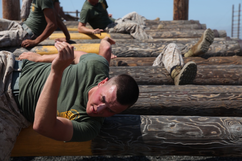 DVIDS - Images - Cpl. Joshua Thomas weaves over and under logs while ...
