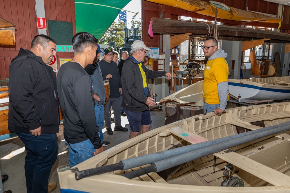 DVIDS - Images - USS Frank Cable (AS 40) Sailors participate in a COMREL at Queensland Maritime ...