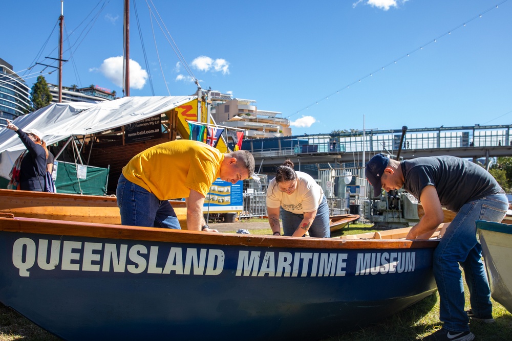 DVIDS - Images - USS Frank Cable (AS 40) Sailors participate in a COMREL at Queensland Maritime ...