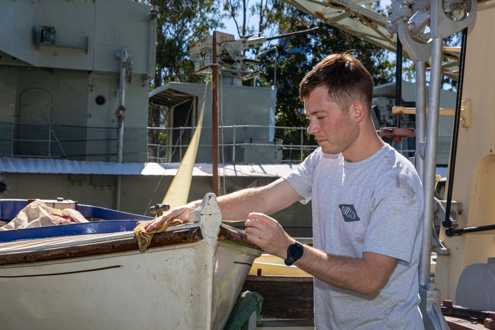 DVIDS - Images - USS Frank Cable (AS 40) Sailors participate in a COMREL at Queensland Maritime ...