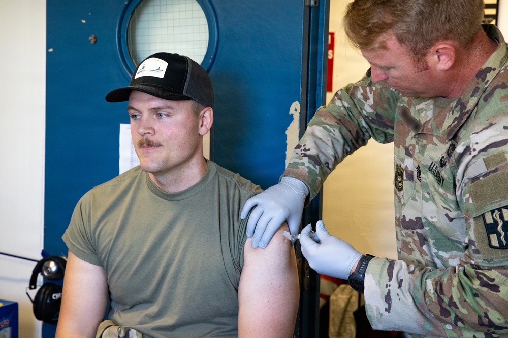 DVIDS - Images - Combat medic specialist administers flu vaccinations ...