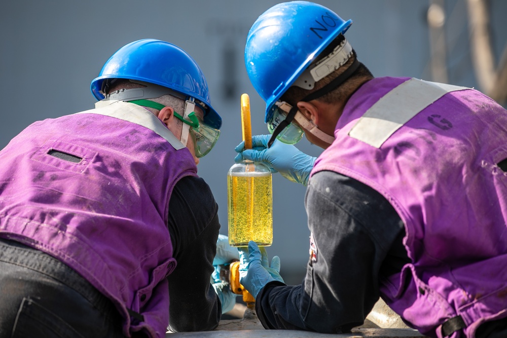 DVIDS - Images - USS Mitscher (DDG 57) Sailors collect fuel sample ...